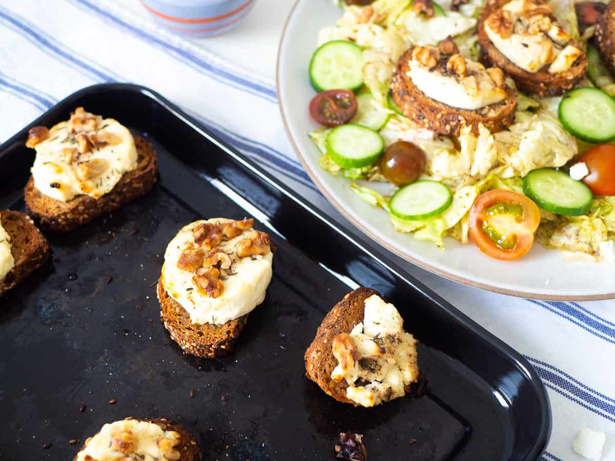 Warm French goat cheese toast (chèvre chaud) on salad